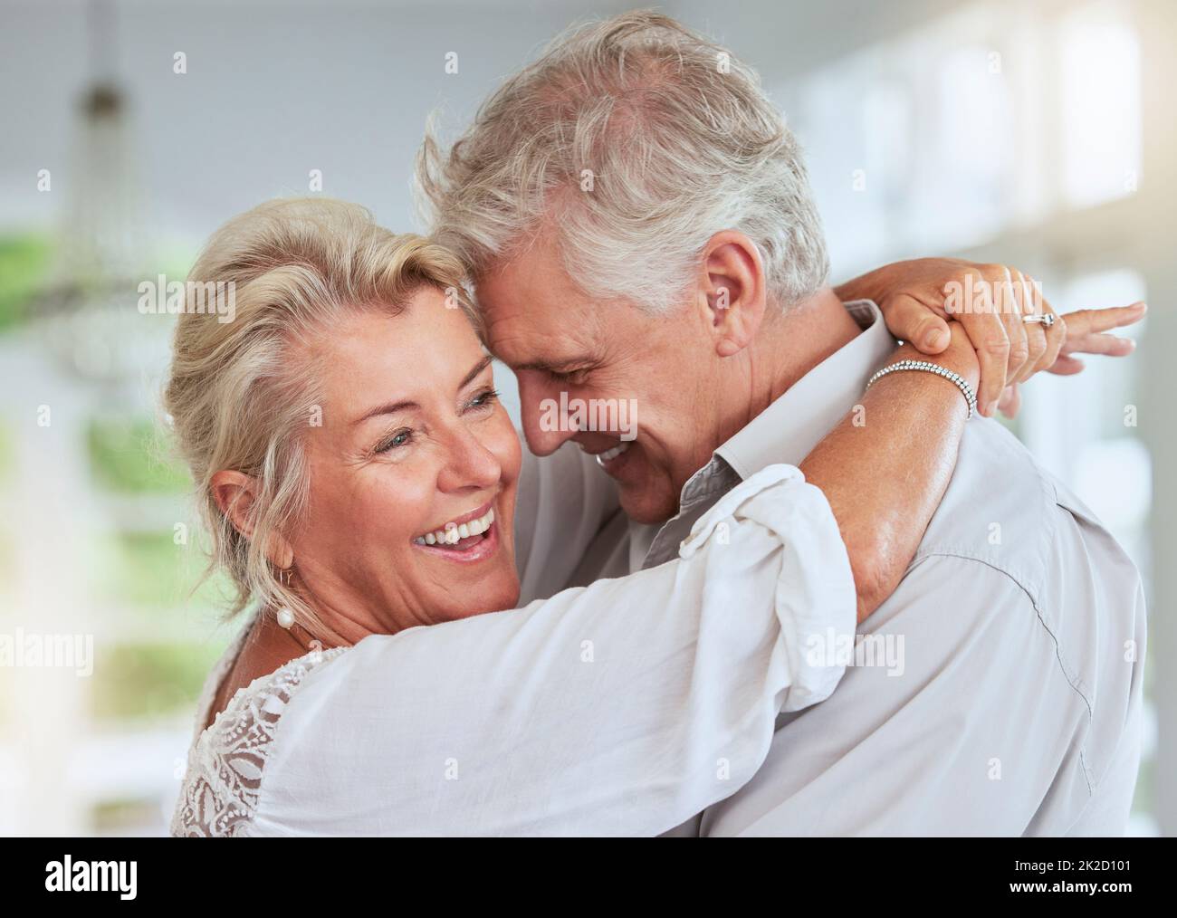 Retirement, hug and happy couple celebration, dancing together with ...