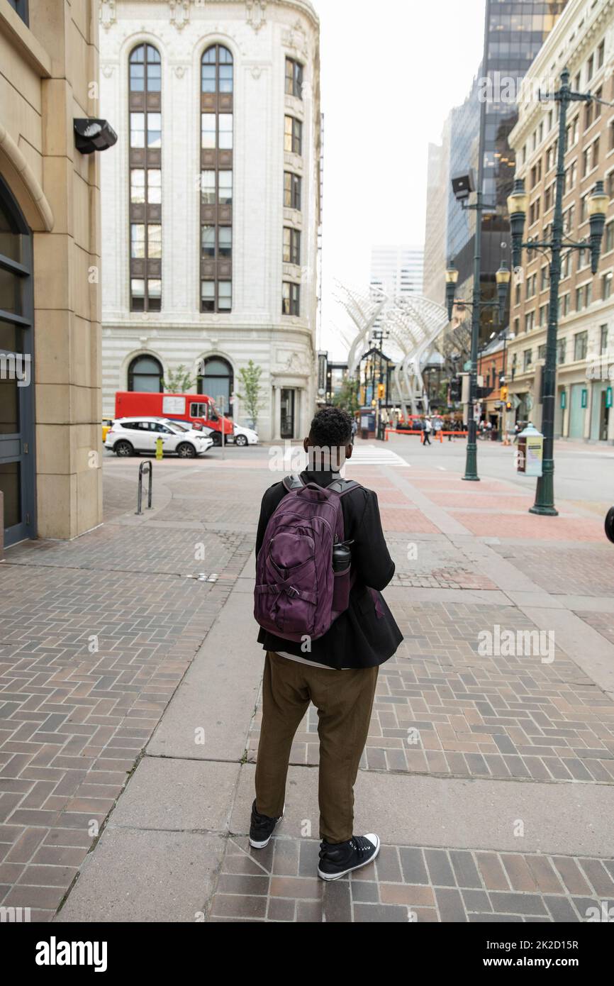 Man backpack african hi-res stock photography and images - Alamy