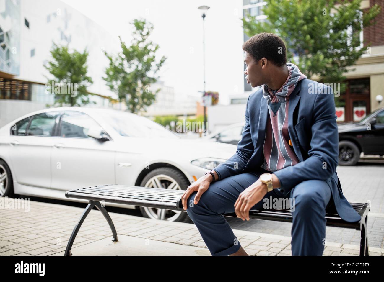 Person Waiting On A Bench