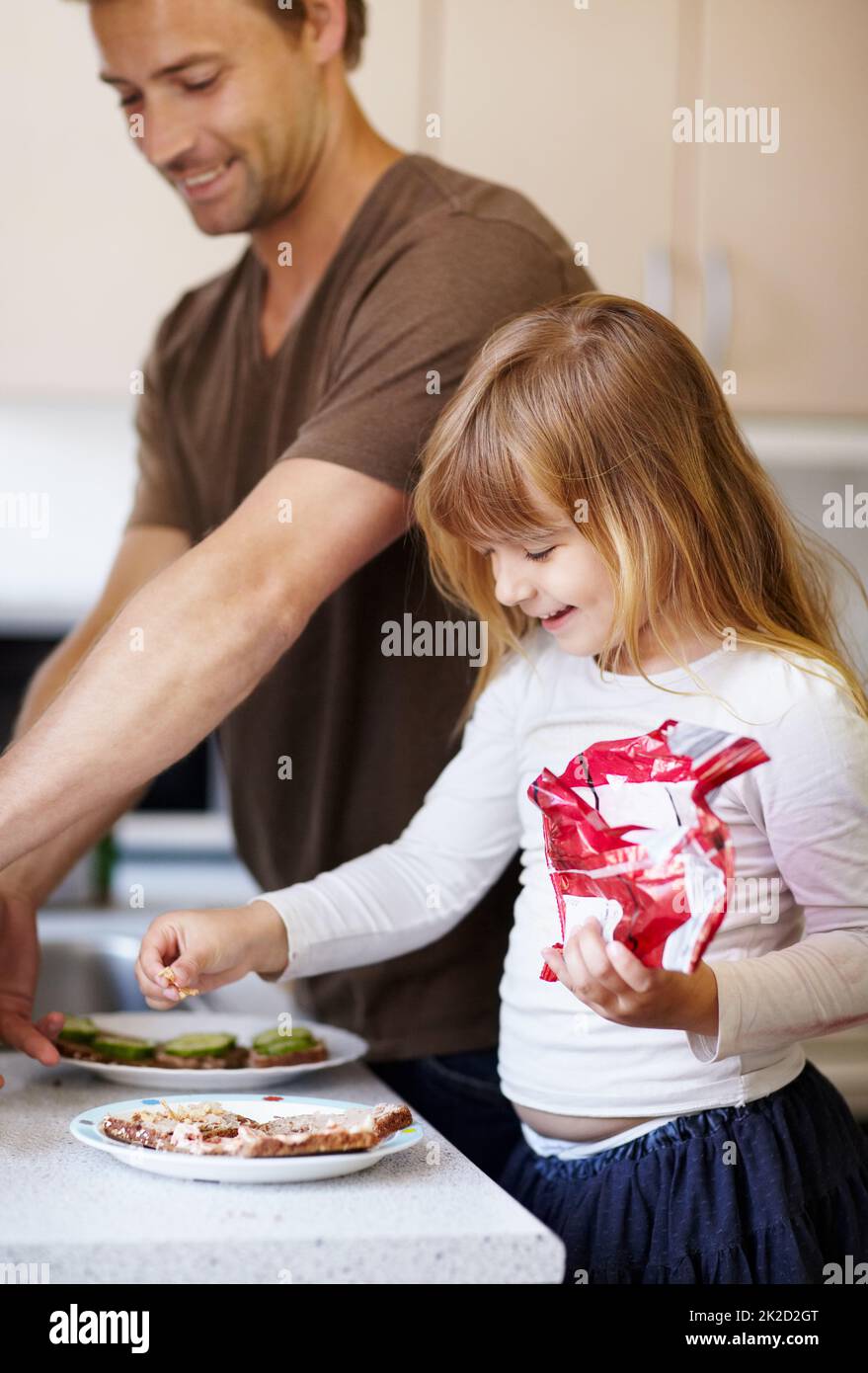 Child making breakfast hi-res stock photography and images - Alamy