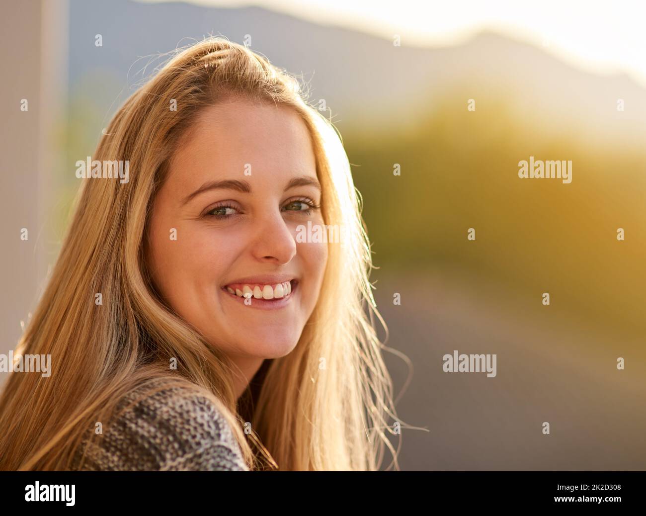 Welcoming the bright summer days with a big smile. Portrait of an ...