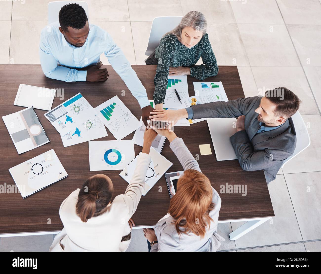 Team, hands together and meeting collaboration about analytics of sales ...