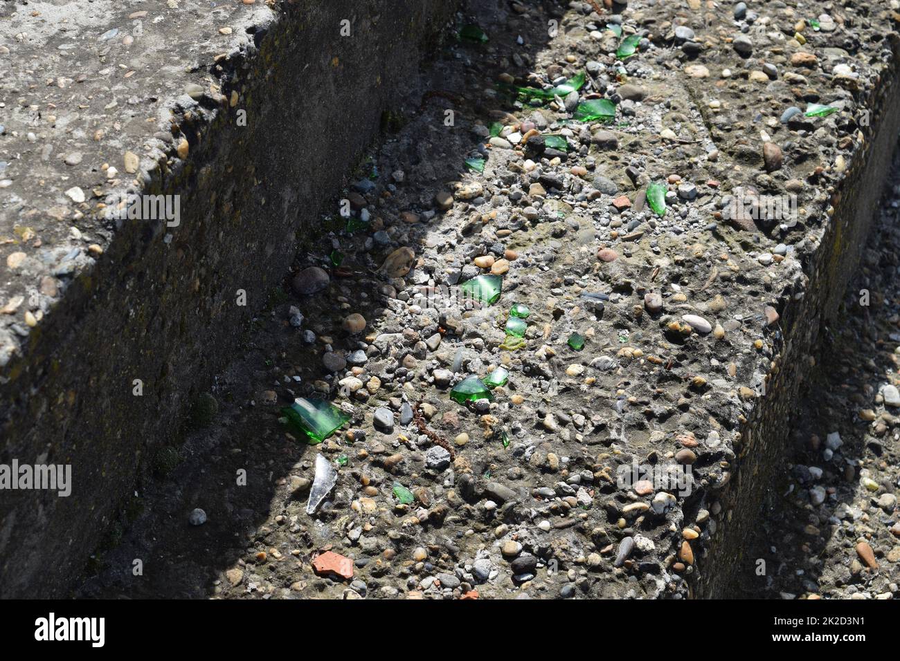 Glass splinters on concrete steps Stock Photo - Alamy
