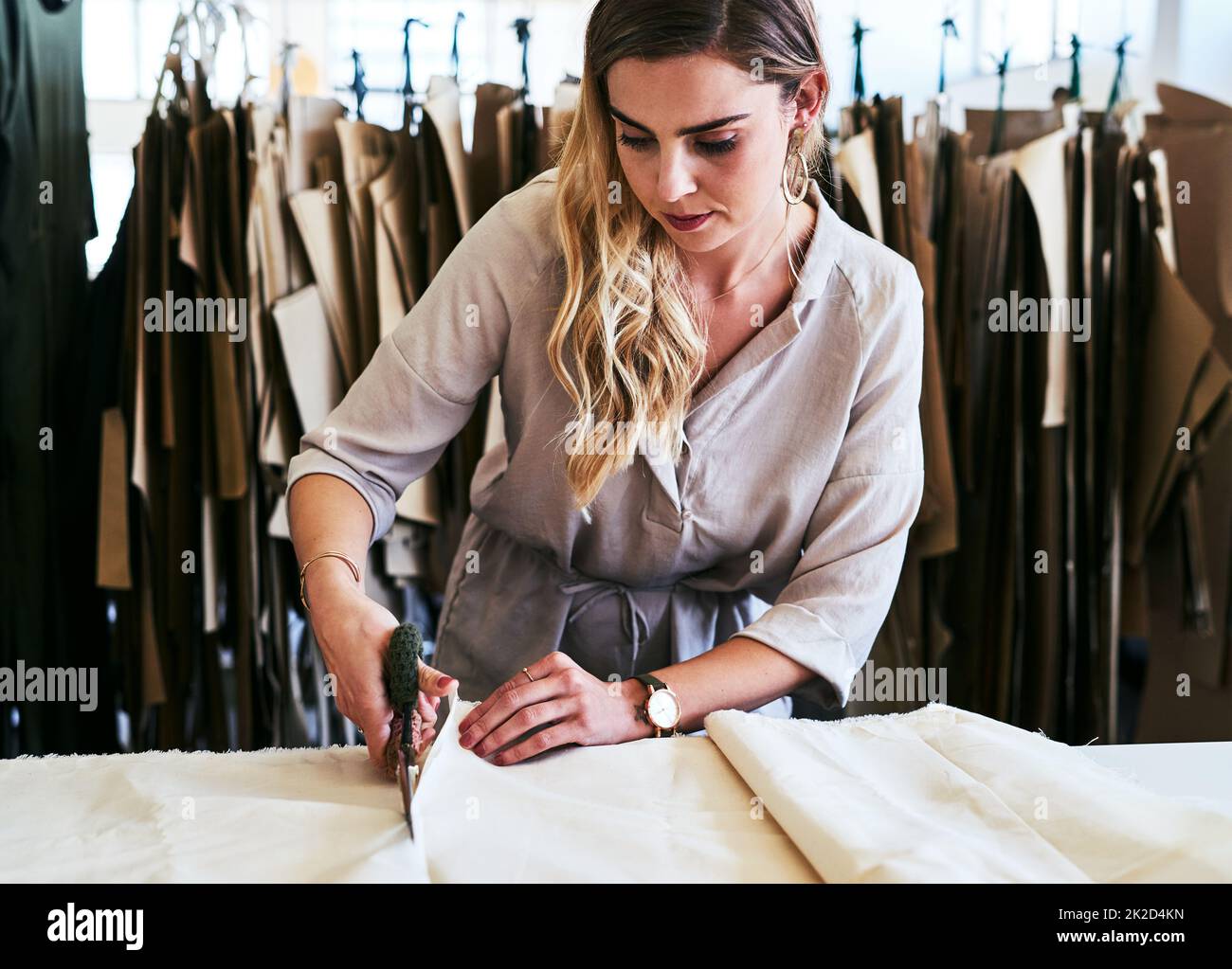 Cutting fabric hi-res stock photography and images - Alamy