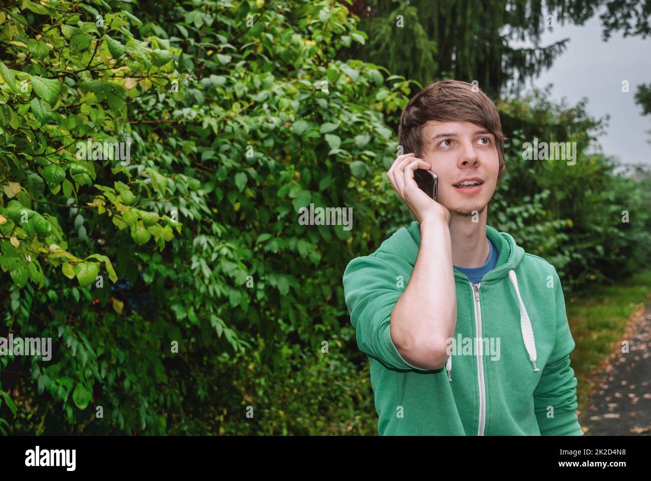 Portrait cheerful young man talking hi-res stock photography and images ...