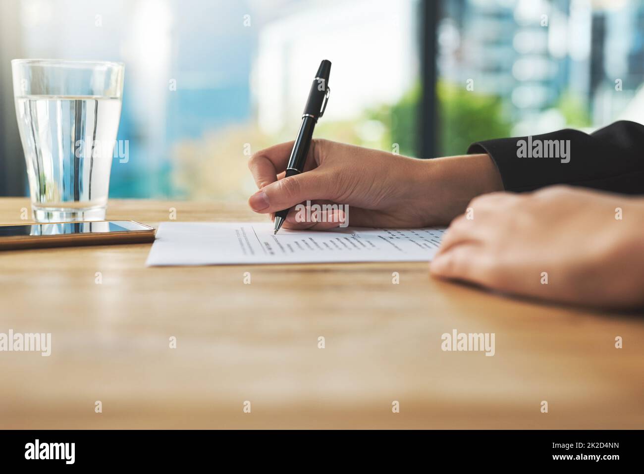 Woman desk signing documents hi-res stock photography and images - Alamy