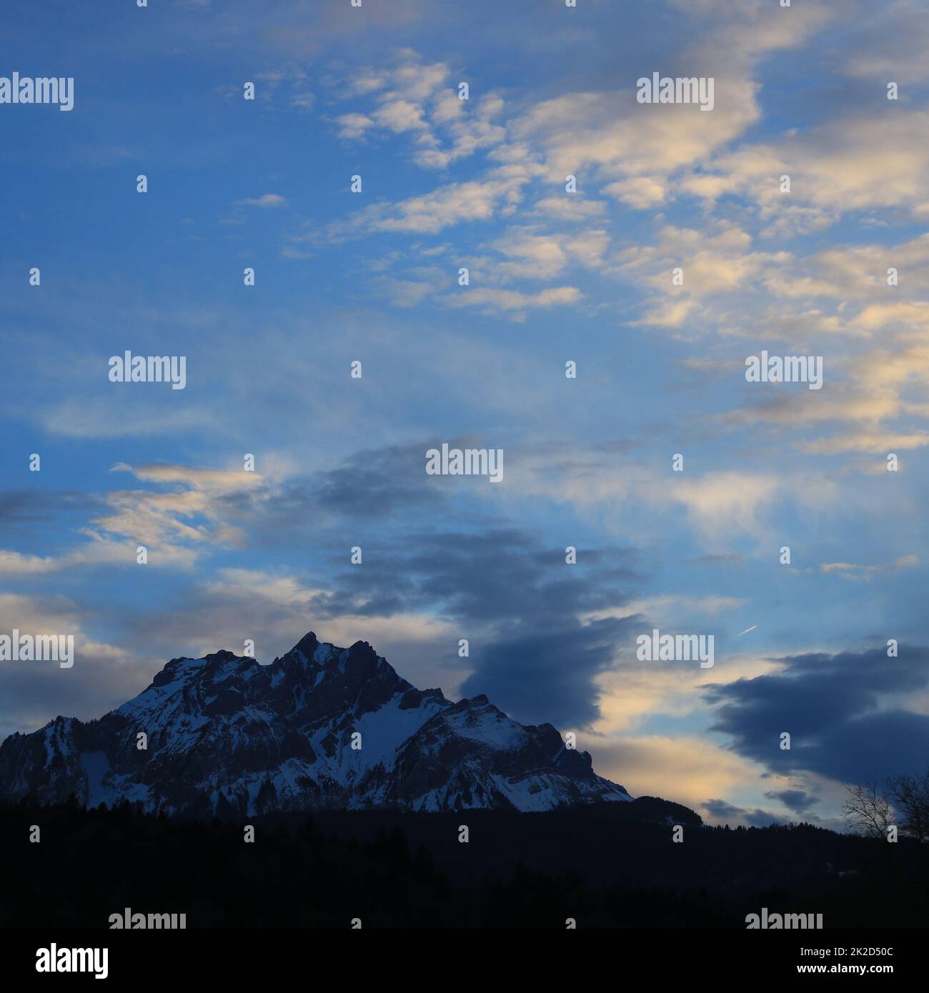 Sun lit clouds over Mount Pilatus, Switzerland Stock Photo - Alamy