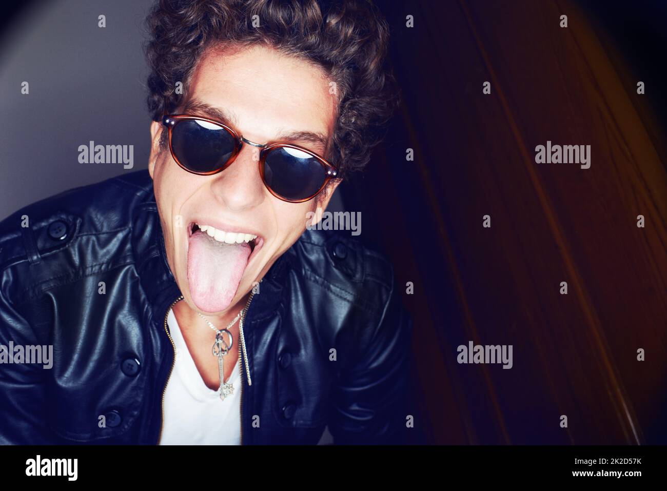 Man tongue out hi-res stock photography and images - Alamy