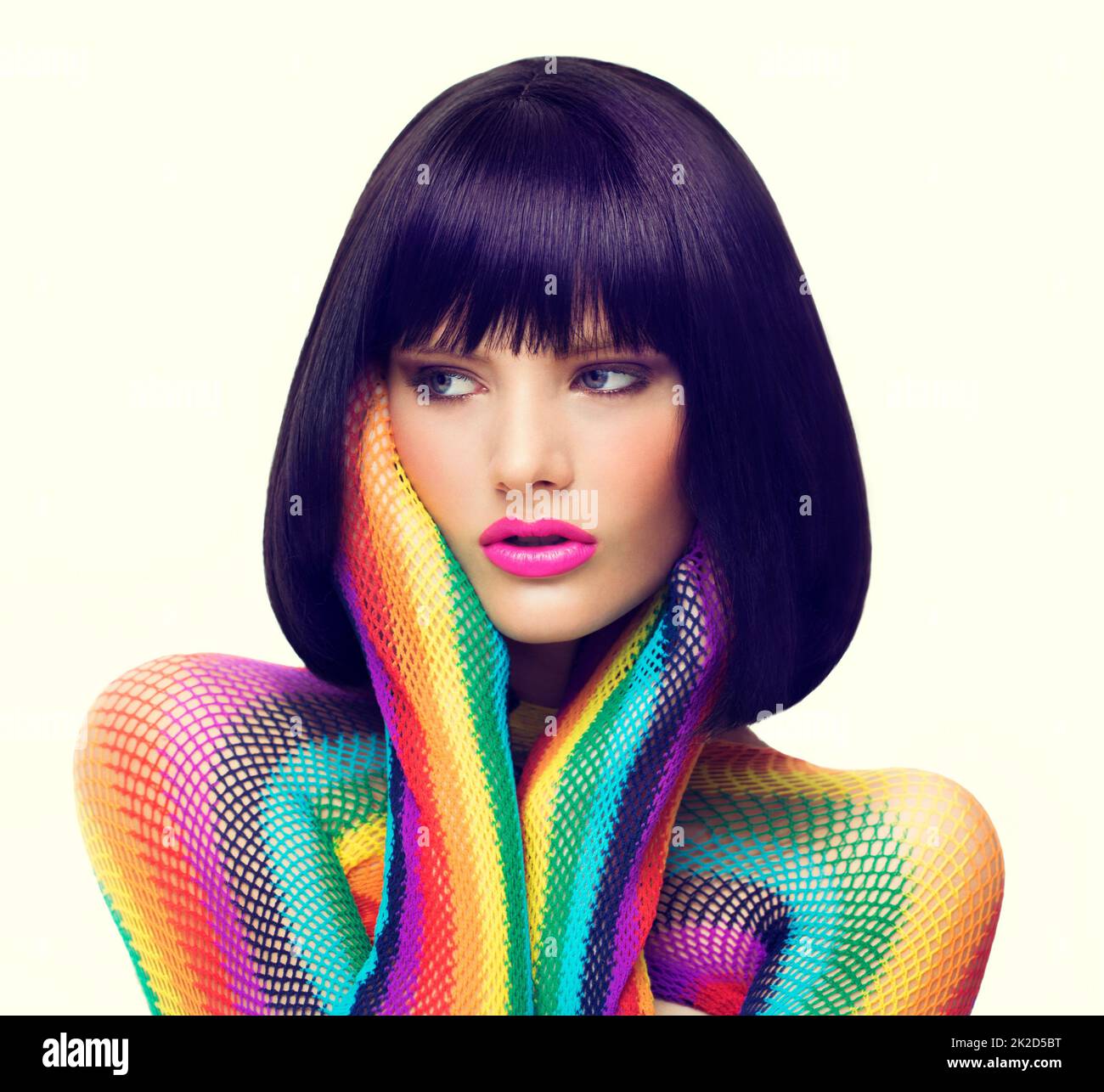 All the colors of beauty. Studio shot of a beautiful young woman ...