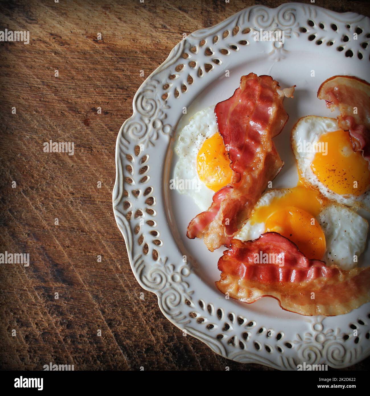 Breakfast , crispy bacon, fried eggs and bread. Sandwiches on white ...