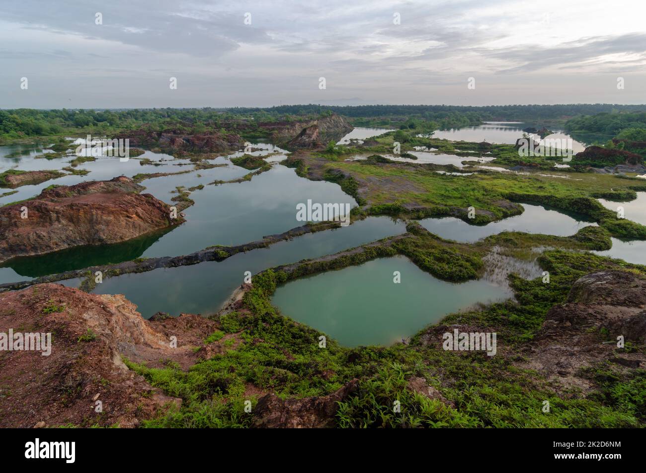 Quarry lake with different green and blue color view Stock Photo - Alamy