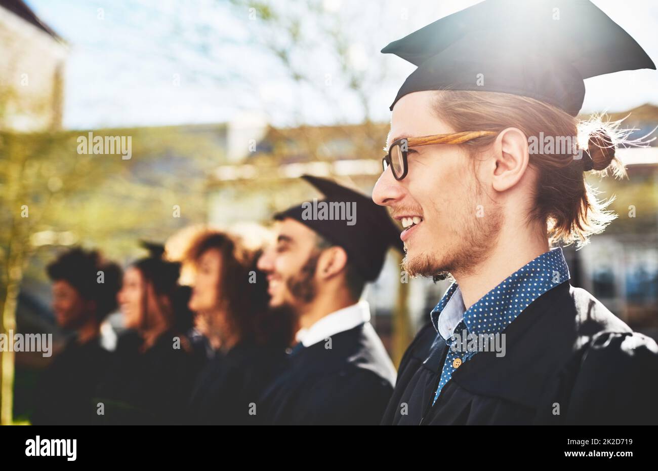 Happy male college graduate classmates hi-res stock photography and ...