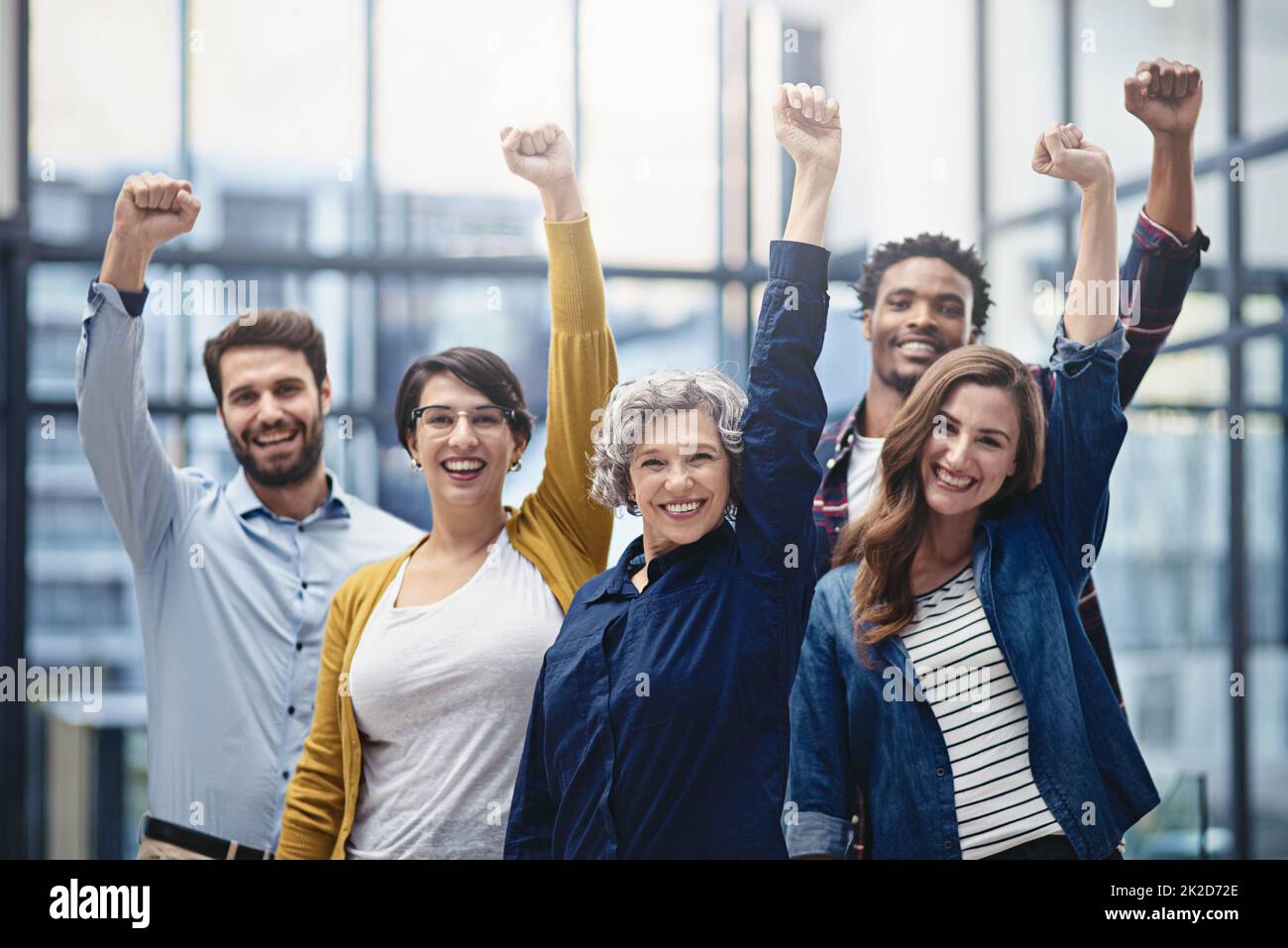 Success needs to be celebrated. Cropped portrait of a group of ...