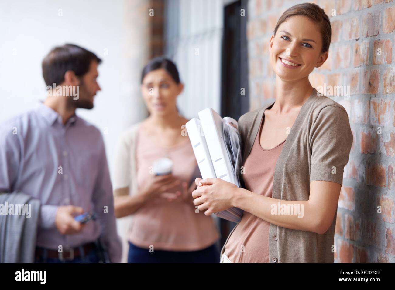 The number one team in the business. Shot of three young colleagues in ...