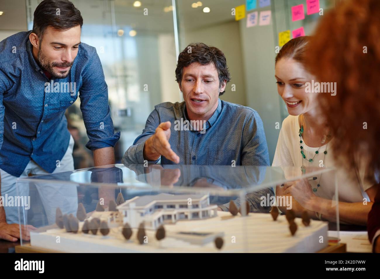 Planning around their clients specifications. Shot of a group of ...