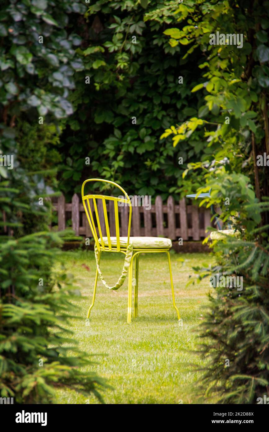 a outdoor chair in the park Stock Photo - Alamy