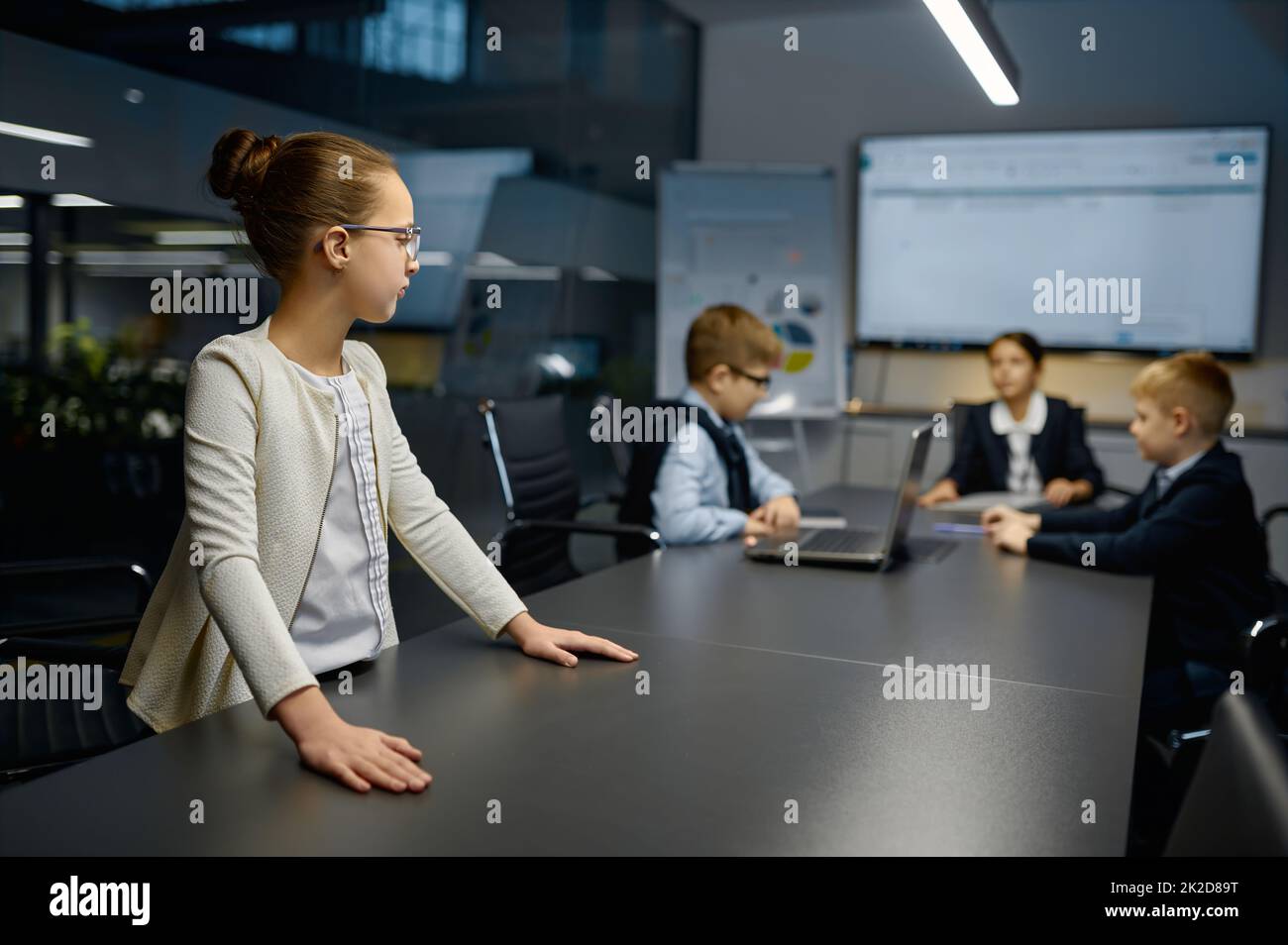 Little business partner disputing at coworking room Stock Photo - Alamy