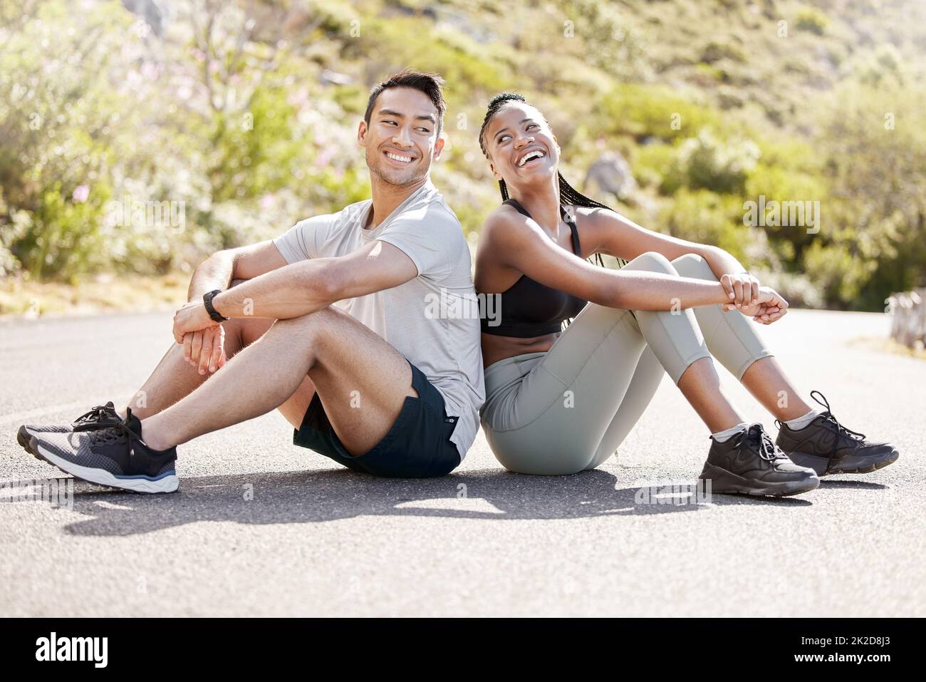 Health, fitness and friends relax after workout in nature, sitting and ...