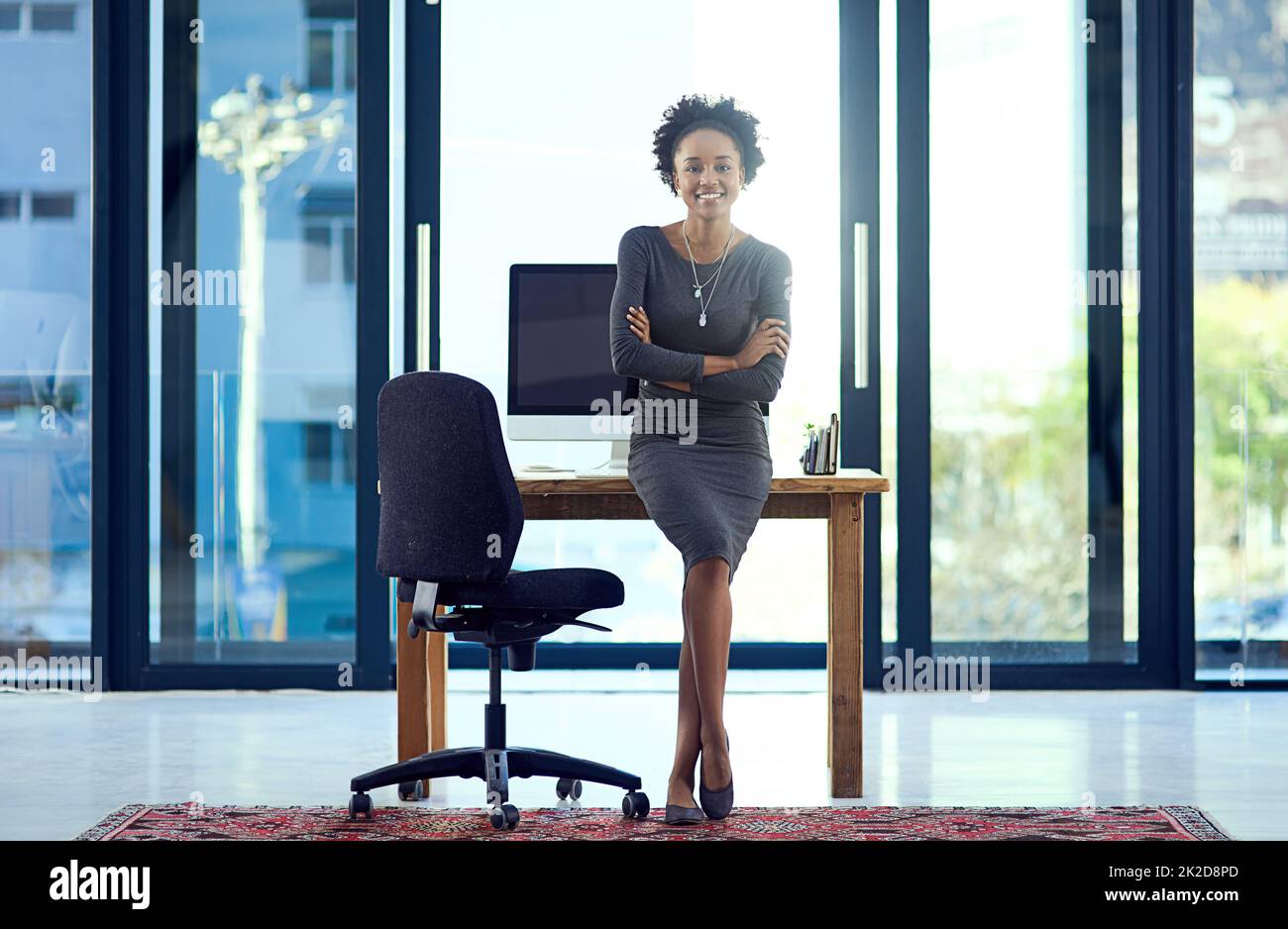 Leaning against a chair hi-res stock photography and images - Alamy