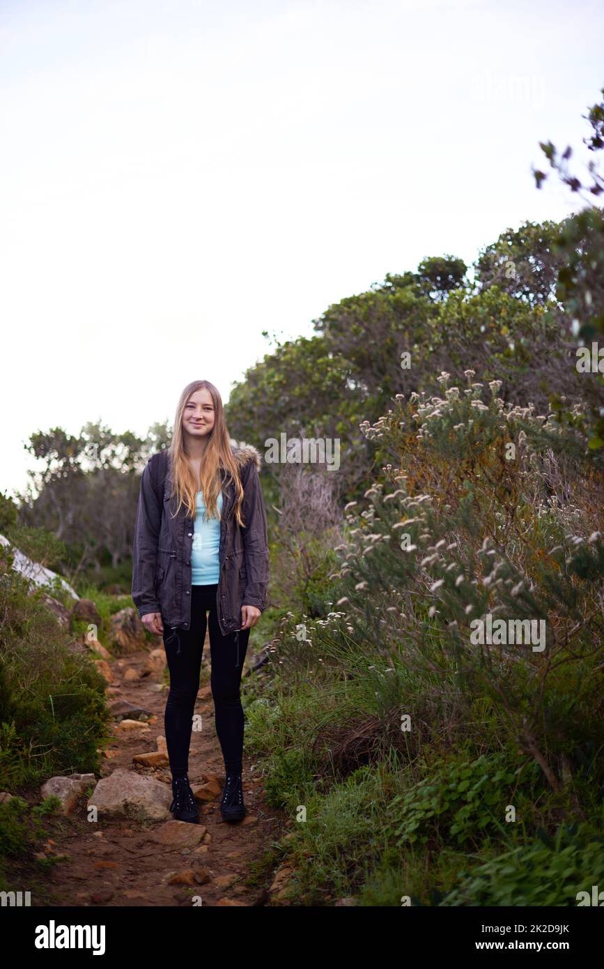 Hiking is her favorite hobby. Full length portrait of an attractive ...