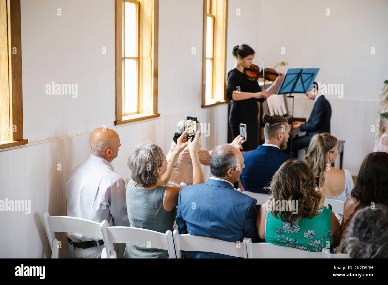 Family Sitting In Church