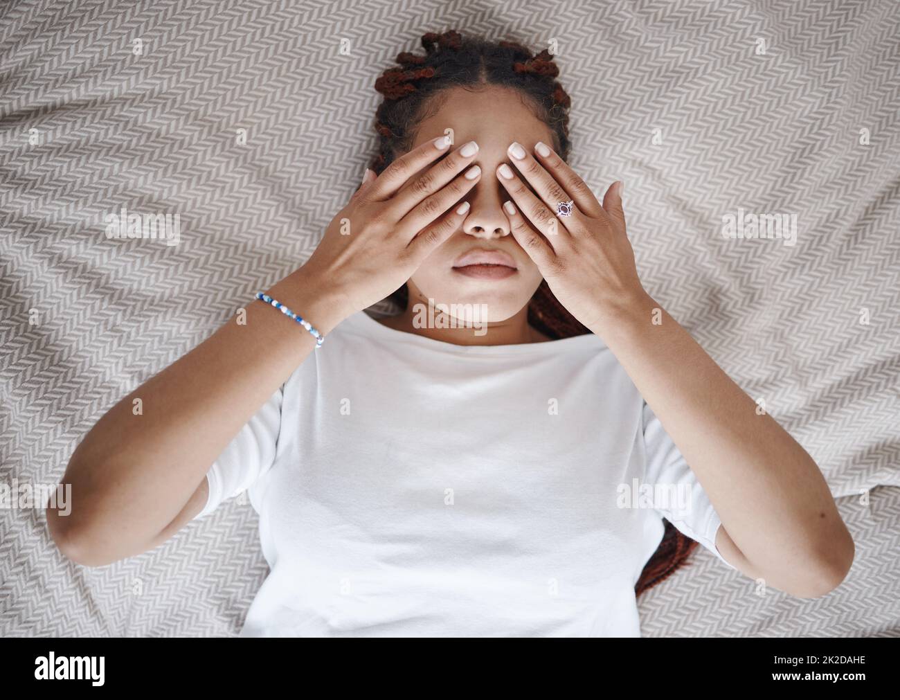 Stress, anxiety and black woman using hands over eyes to calm, relax ...