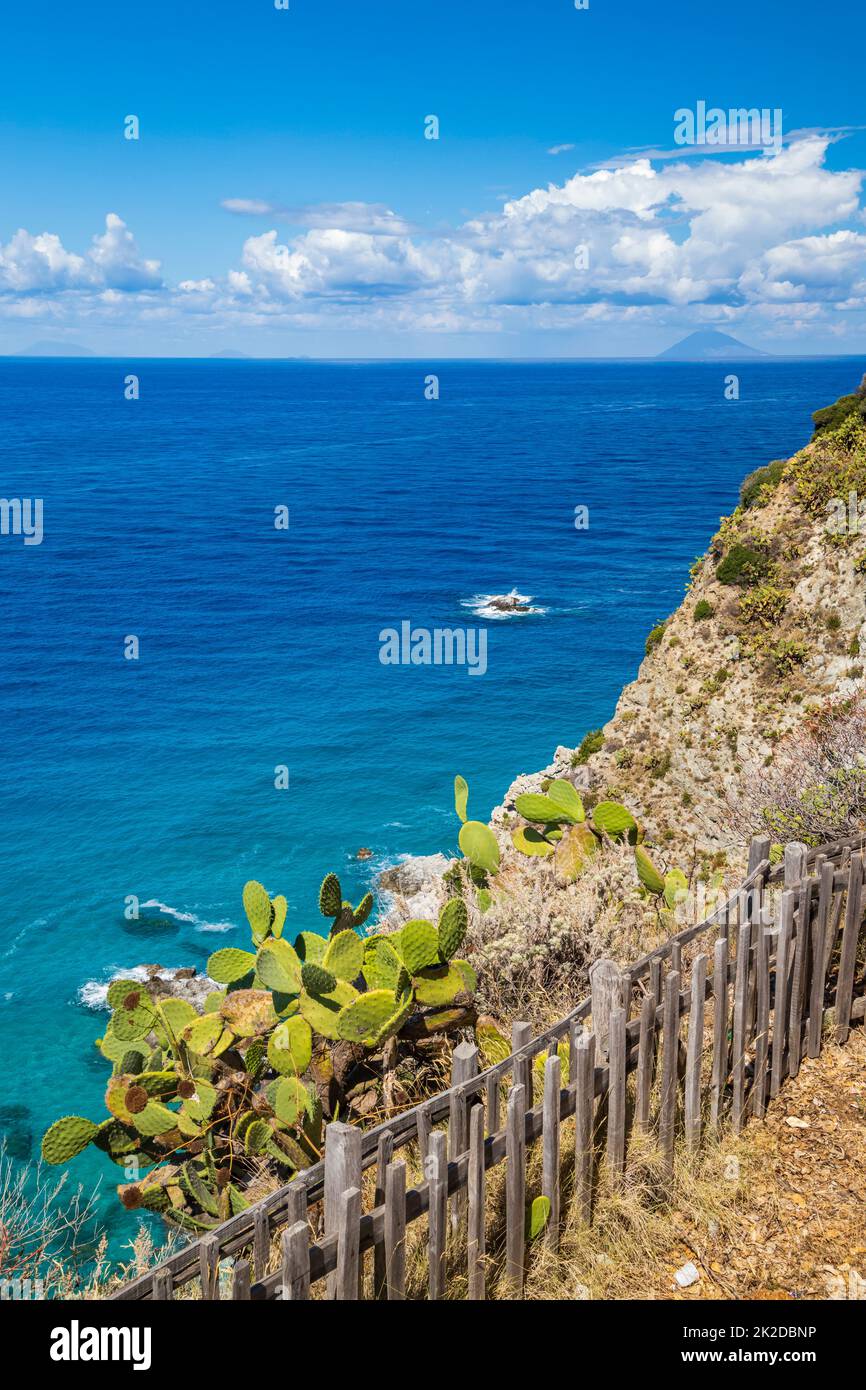 Rock cliff of cape Capo Vaticano with Aeolian Islands, Tyrrhenian Sea ...
