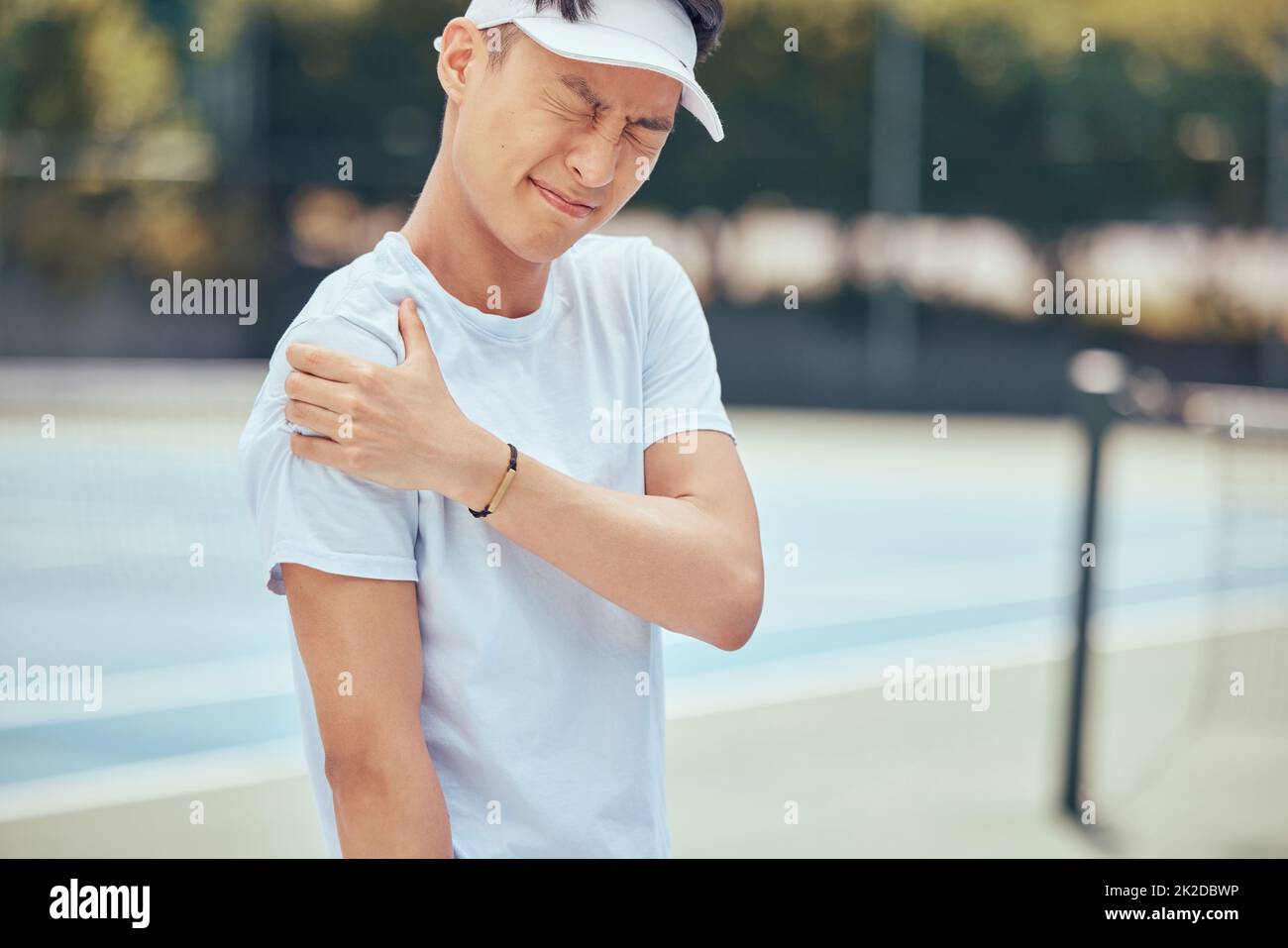 Tennis arm, man and pain on the court while playing competitive and ...