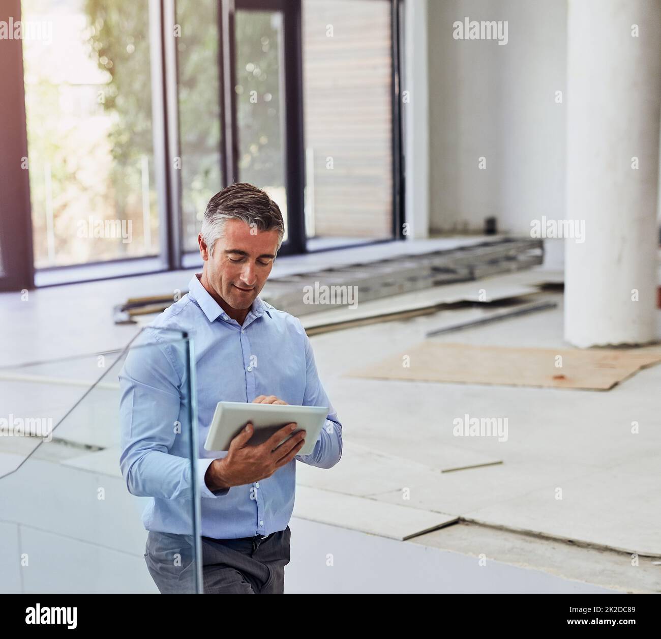 Business man walking off building hi-res stock photography and images ...