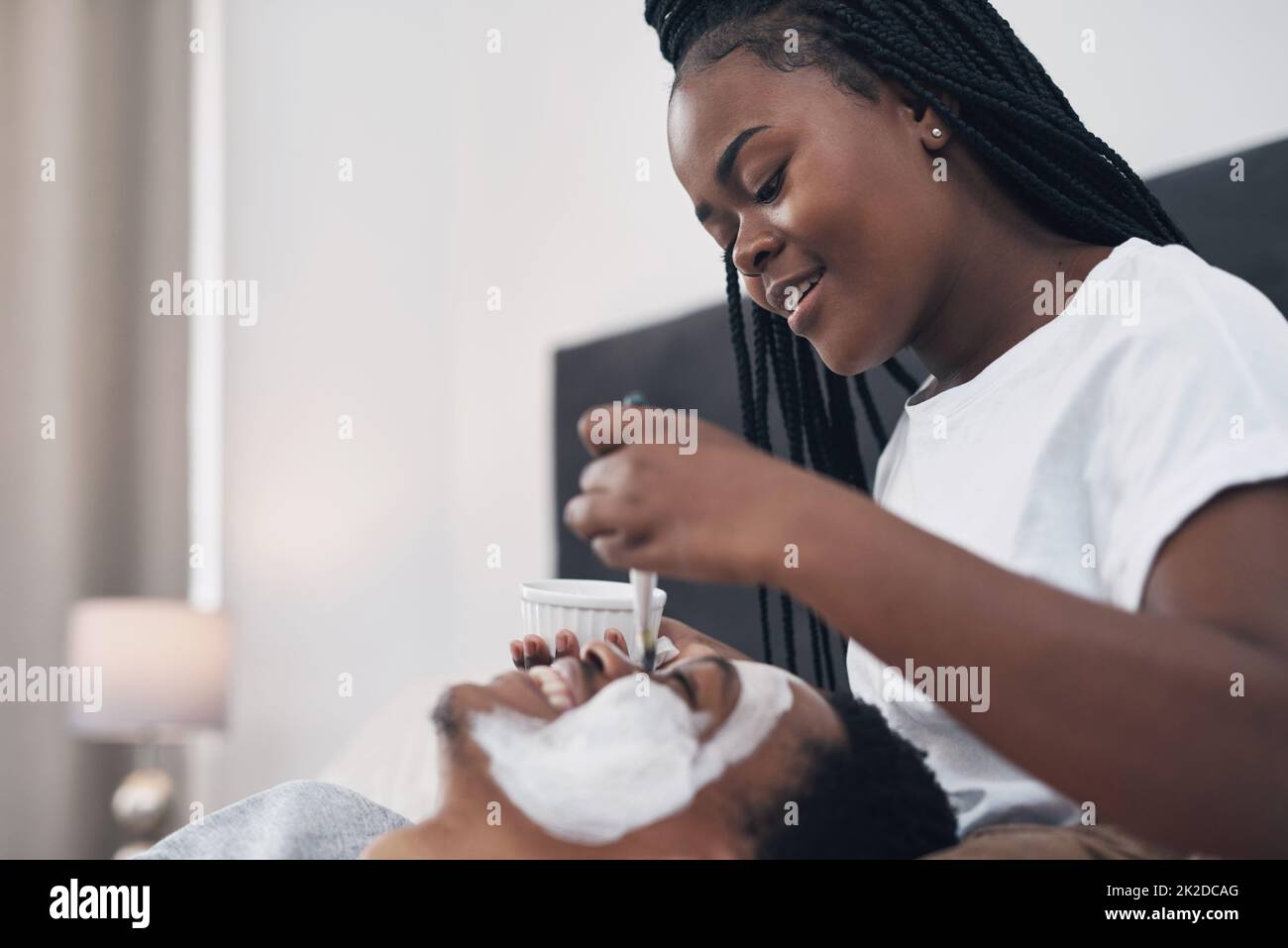 Detoxified skin is a DIY facial away. Shot of a young couple getting ...