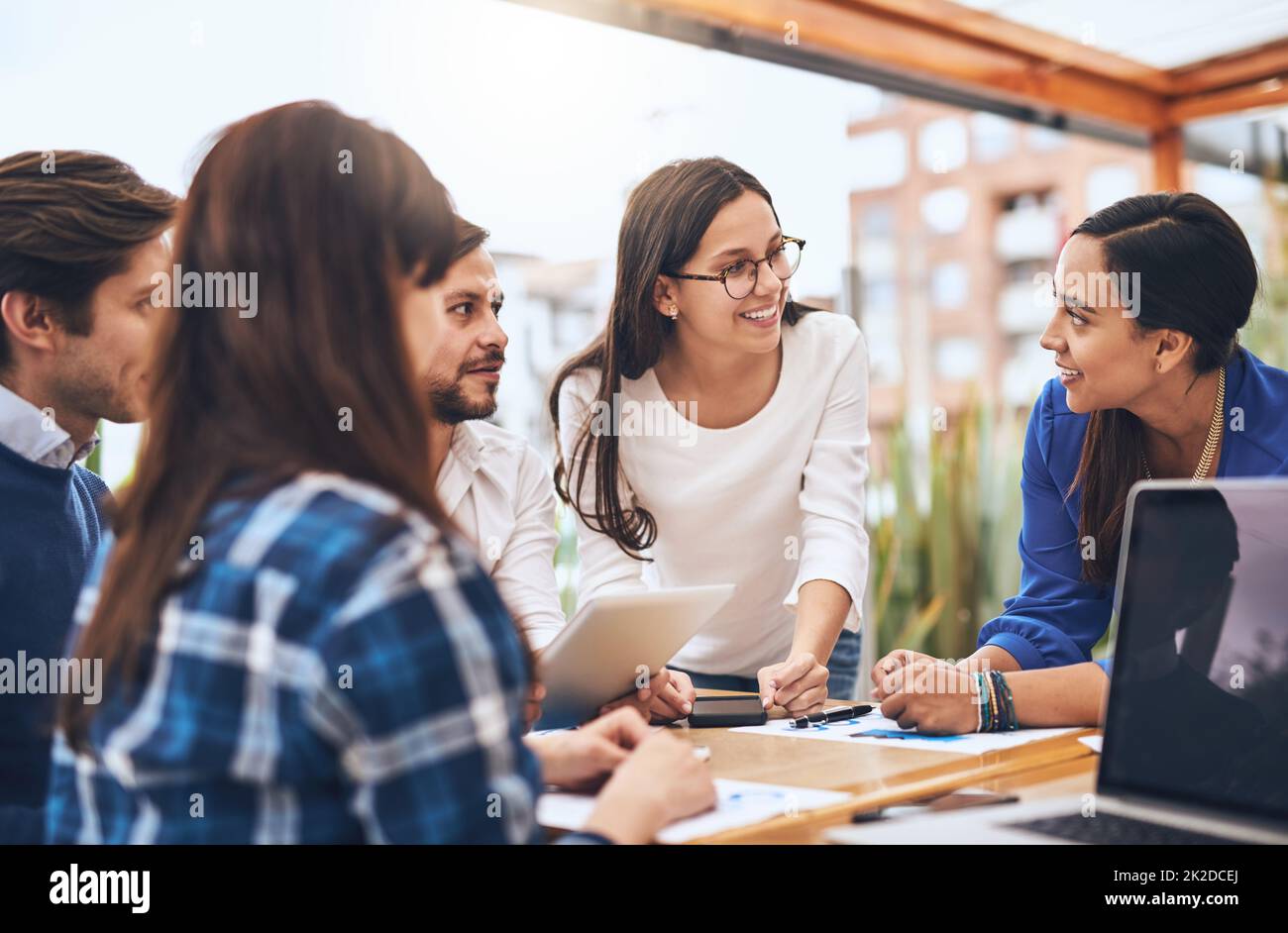 Okay lets go with that. Shot of a group young creative businesspeople ...
