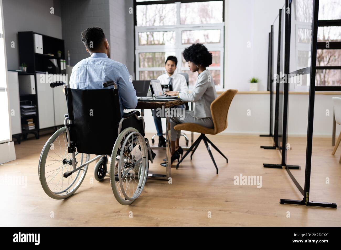 Diverse office disabled meeting hi-res stock photography and images - Alamy