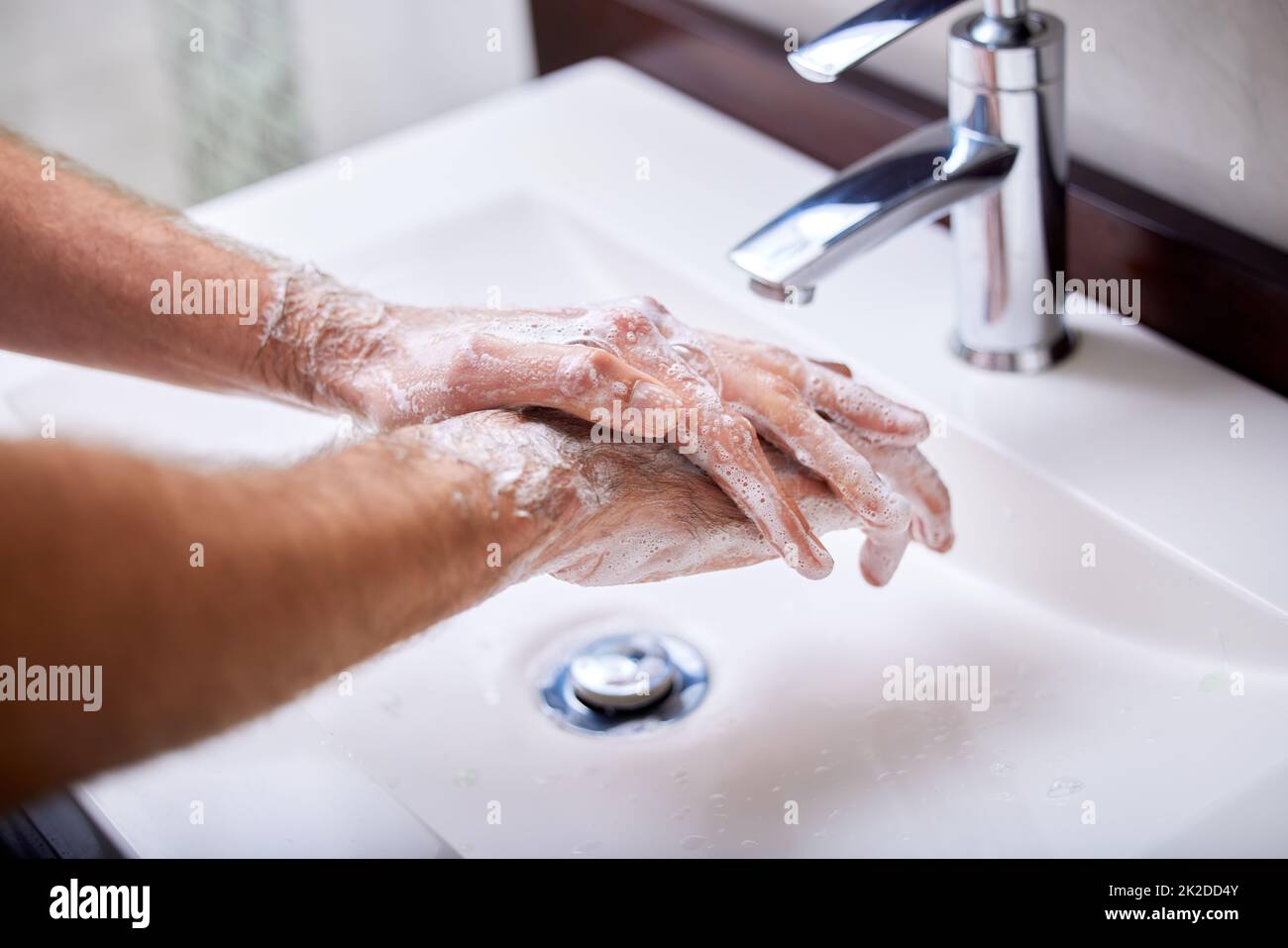 Washing hands man soap hi-res stock photography and images - Alamy