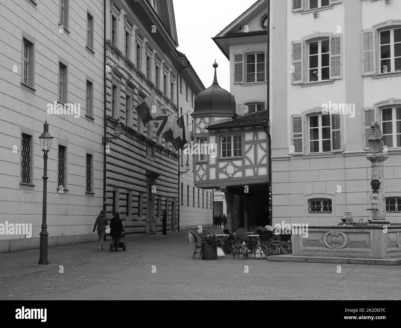 Old ornate timber framework and small tower on the edge of a historic ...