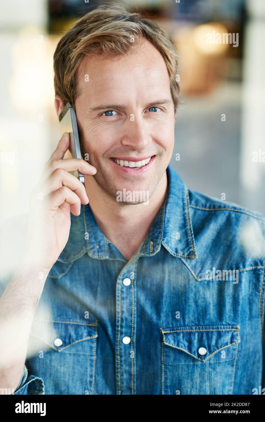 Hes a model employee. a casually-dressed businessman standing in his ...