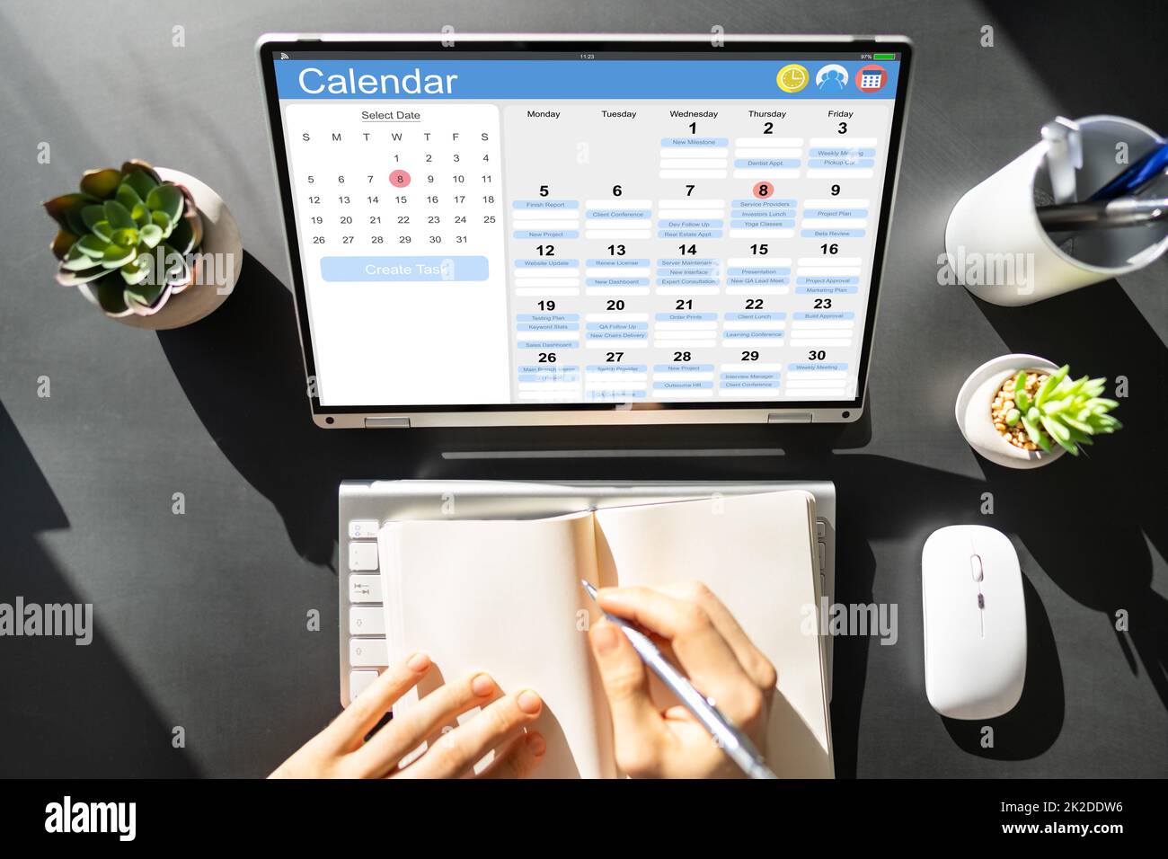 Close-up Of A Business Person Looking At Calendar Stock Photo - Alamy