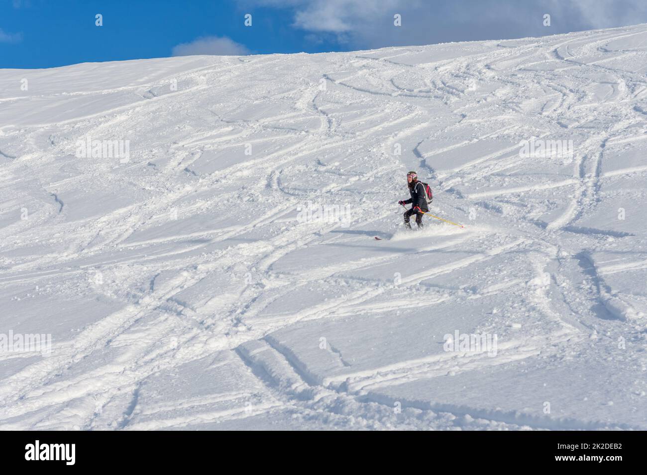 Woman skiing on powder snow hi-res stock photography and images - Alamy
