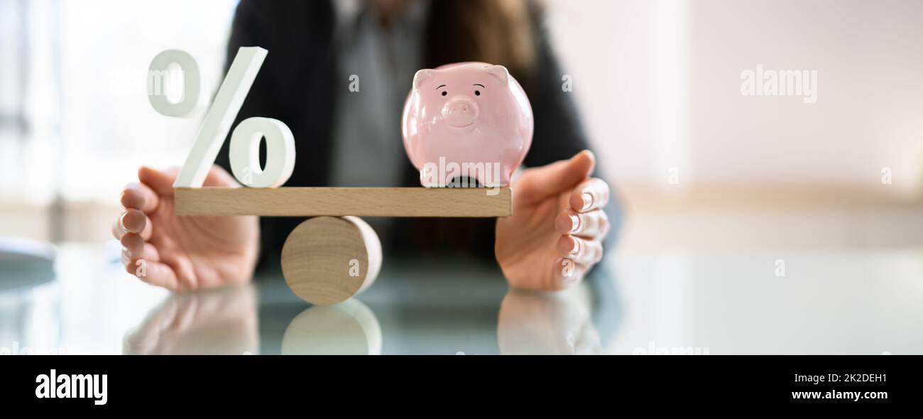 Balance Scale Interest Percentage Stock Photo - Alamy