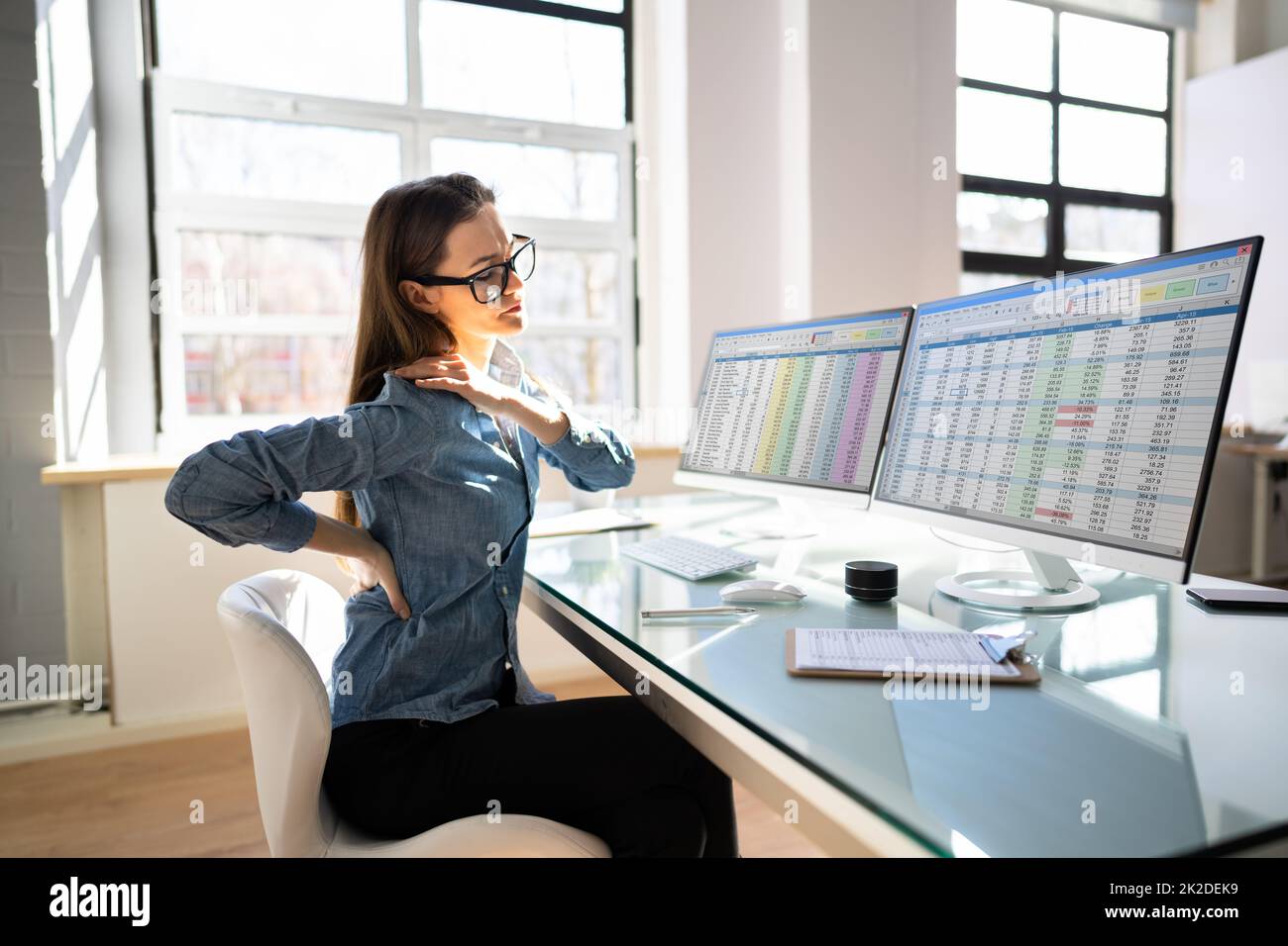 Back Pain Bad Posture Woman Sitting Stock Photo - Alamy
