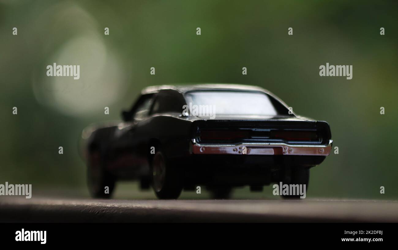 A black die cast toy car Stock Photo - Alamy