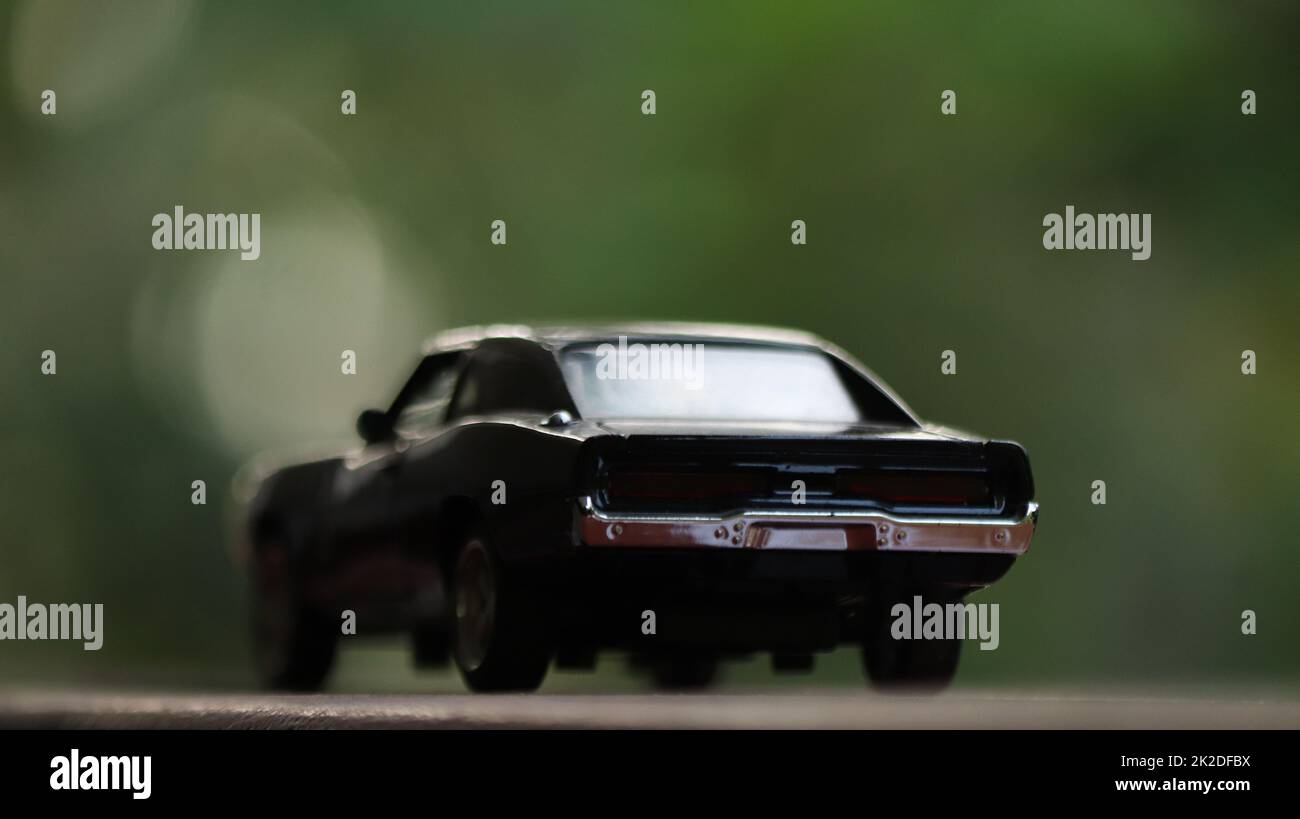A black die cast toy car Stock Photo - Alamy