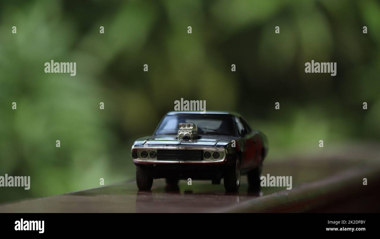 A black die cast toy car Stock Photo - Alamy