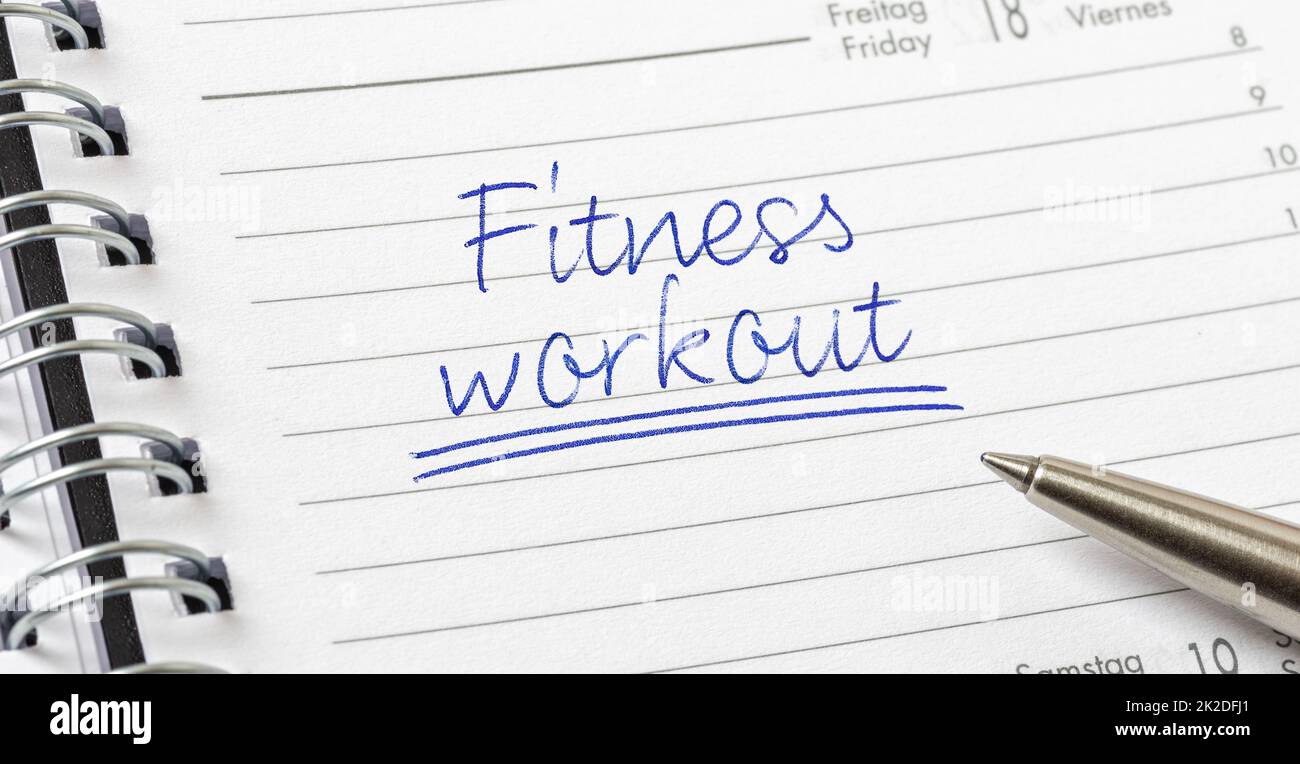 Fitness workout written on a calendar page Stock Photo - Alamy