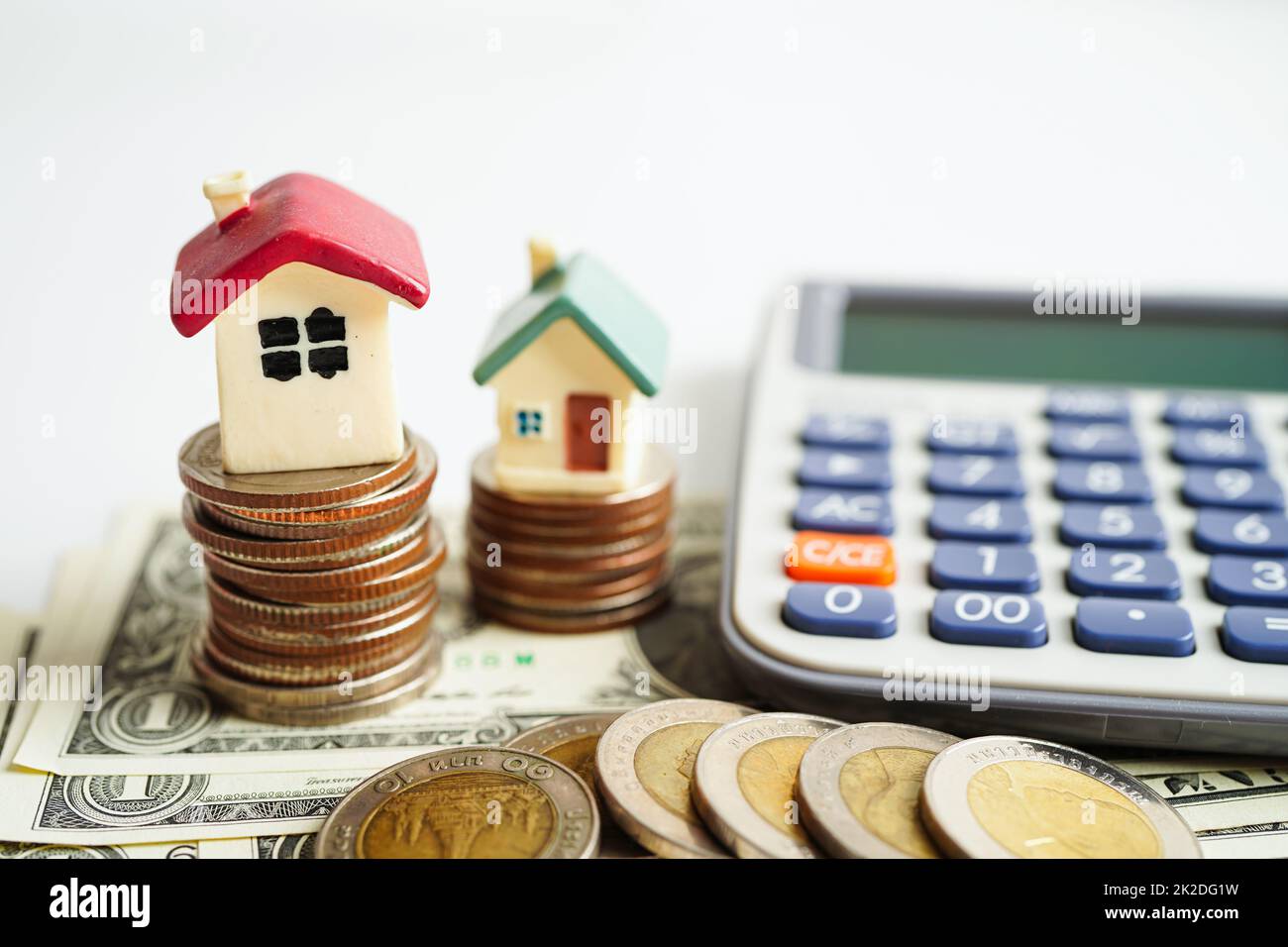 House on coins money, saving bank, real estate investment, .installment ...