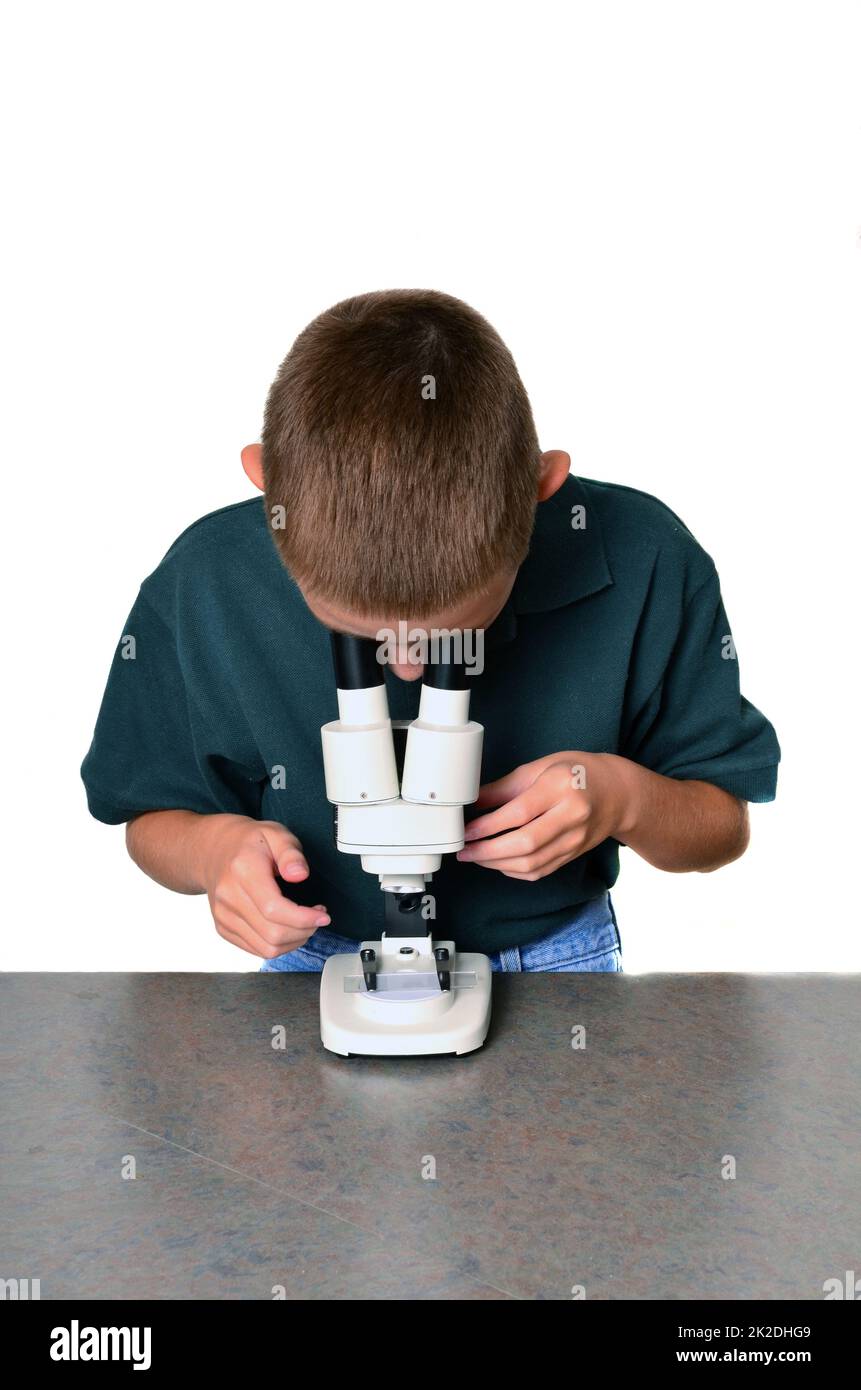 Young Boy Using a Microscope Stock Photo - Alamy