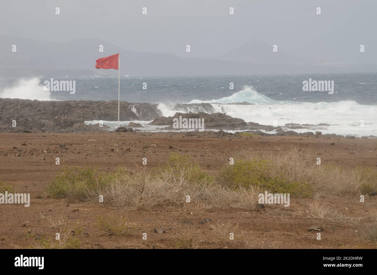 Flag prohibiting swimming in rough seas Stock Photo - Alamy