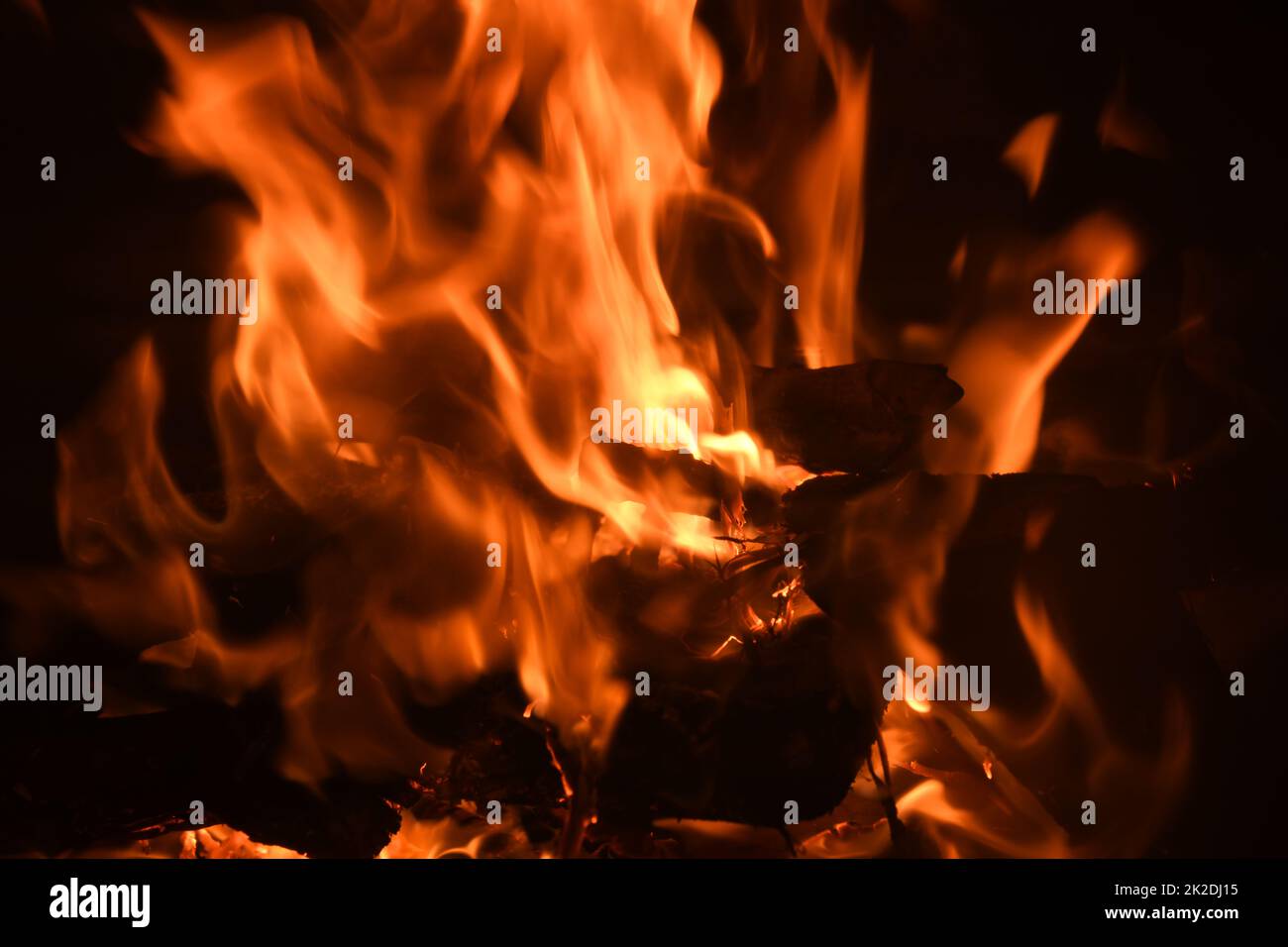 Cozy and warming log fire in the fireplace, in the province of Alicante ...