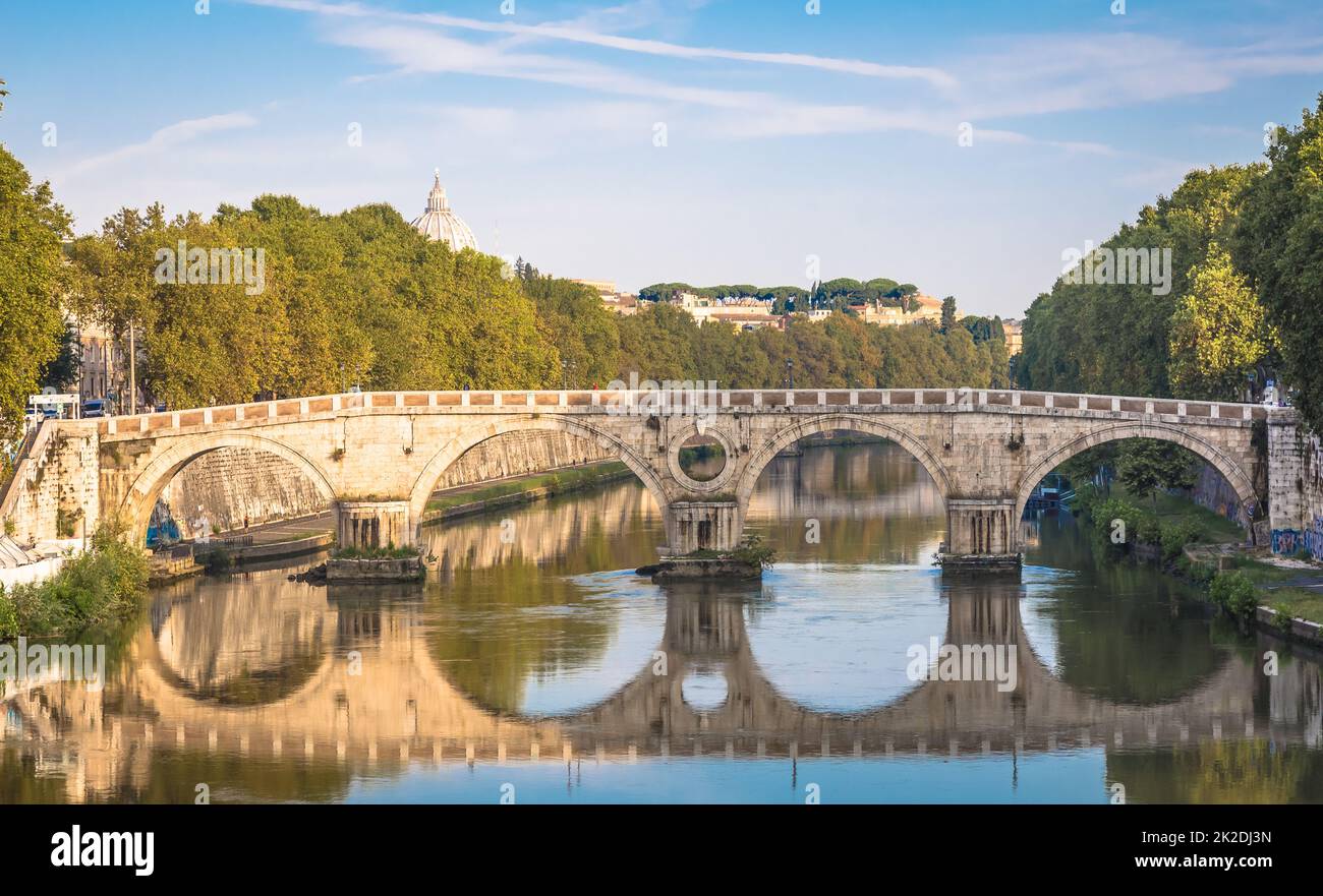 Bridge on Tiber river in Rome, Italy. Vatican Basilica cupola in ...