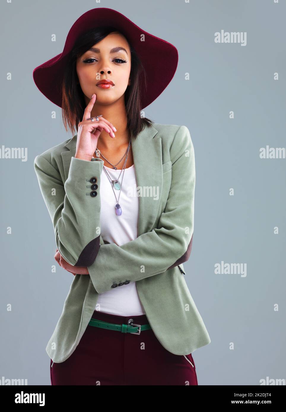 Sophisticated beauty. Studio portrait of a stylish young woman posing ...