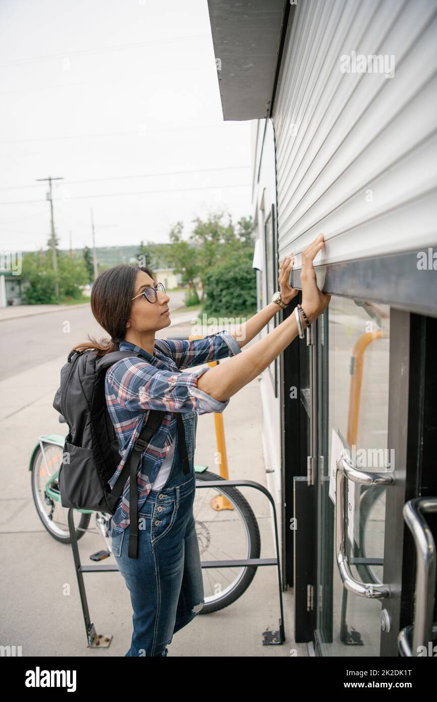 Woman opening gate hi-res stock photography and images - Alamy